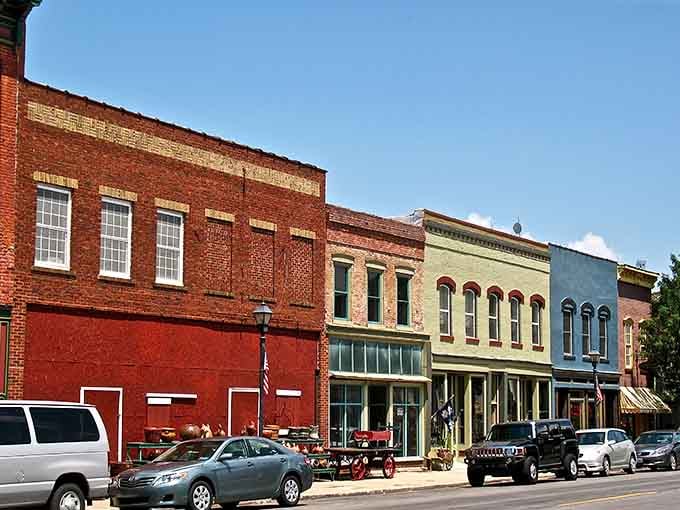 Brick storefronts stand shoulder-to-shoulder like old friends sharing stories from decades past.