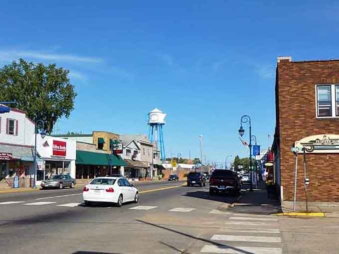 That classic water tower stands tall like a lighthouse guiding hungry travelers to this unexpected restaurant destination on the prairie.