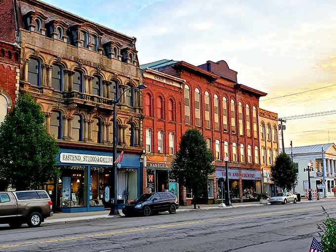 Golden hour bathes these historic facades in warm light that makes every brick glow like it's auditioning for a postcard.
