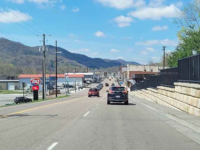 Mountains rise in the distance beyond this main drag, reminding you why people settled here generations ago.