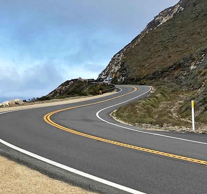 These coastal curves hug the cliffside tighter than your grandmother at Thanksgiving dinner, and twice as memorable.