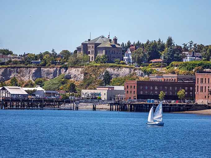 Victorian homes perch on the bluff like elegant sentinels watching over the sparkling waters of Puget Sound below.