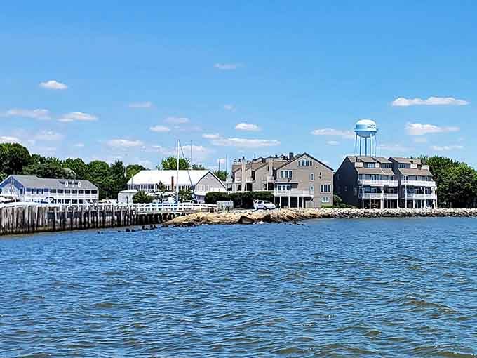 That blue water tower stands sentinel over Rock Hall's waterfront like a lighthouse guiding weary souls to peaceful shores.