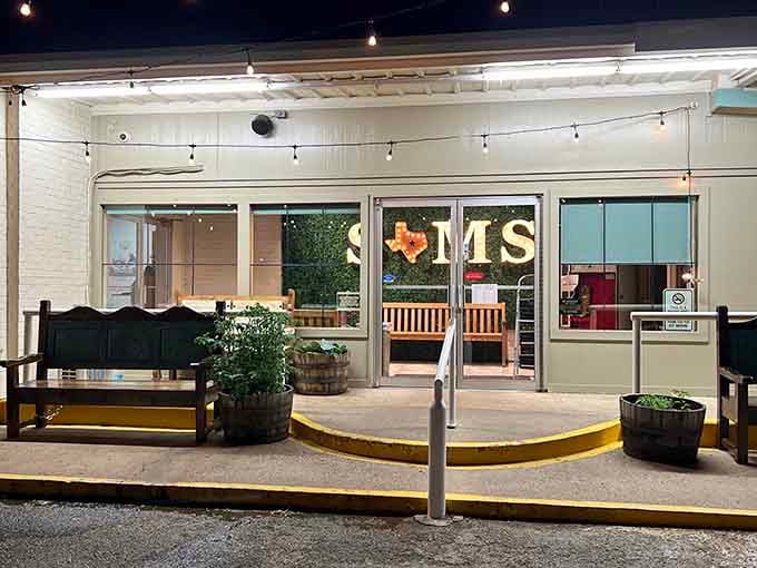 The welcoming entrance glows under evening lights, promising plates piled high with country cooking that never disappoints anyone.