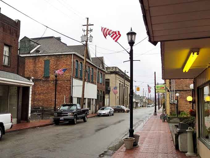 American flags wave along quiet streets where neighbors still know each other and parking is never a problem.