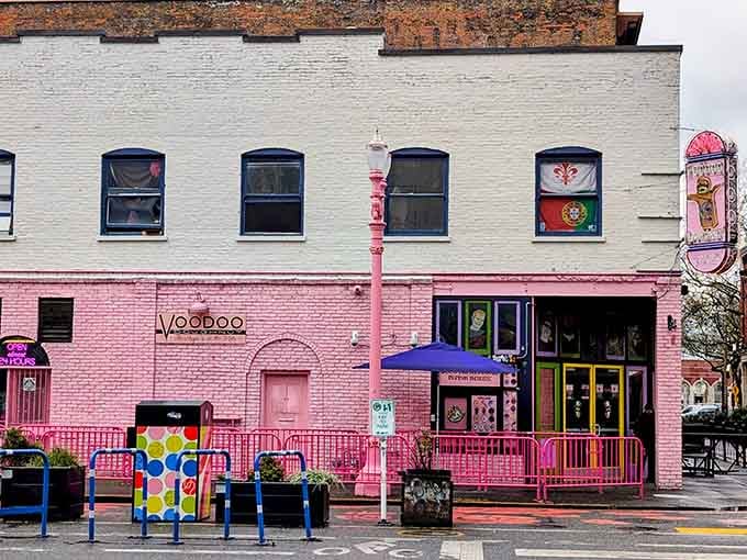 Pink brick and playful colors make this building pop like a carnival, announcing sweet adventures before you even step inside.