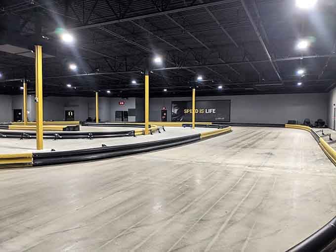 The pristine track stretches out like a racing fan's fever dream, all curves and possibilities under bright lights.