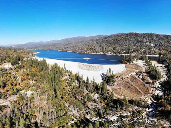 From up here, the reservoir stretches out like California's best-kept secret, wrapped in evergreen forests and endless blue sky.
