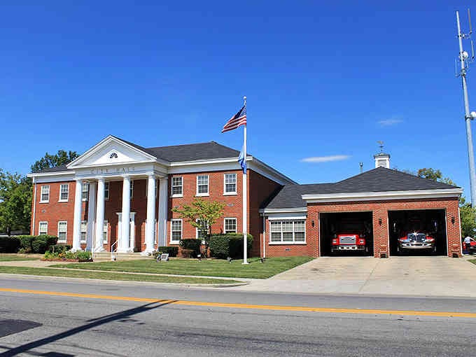Those white columns and red brick practically shout "small-town America" louder than a marching band on the Fourth of July.