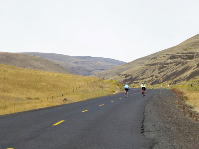 Friends on bikes discover what locals know: sometimes the journey beats the destination, especially with views like these.