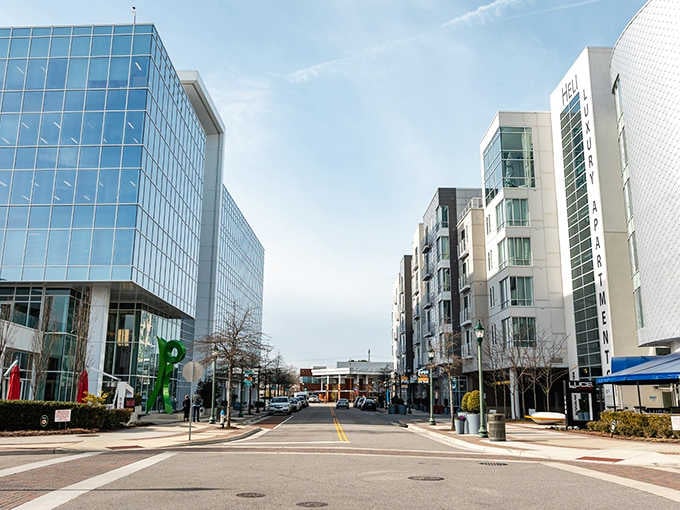 Modern glass buildings rise up while maintaining a sense of openness that keeps the sky feeling close.