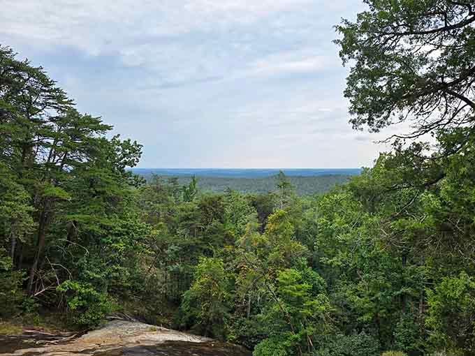 The granite outcrop offers sweeping views that stretch to the horizon, proving the best seats don't require reservations.
