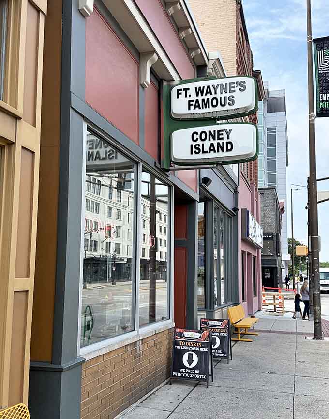 That classic storefront window opens wide to serve generations of Fort Wayne families their beloved coney tradition.
