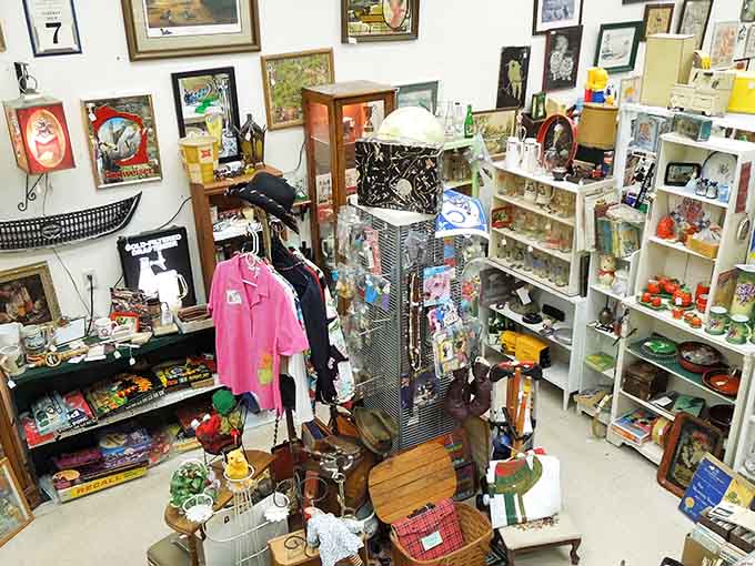 Every corner of this booth is packed with vintage treasures, from colorful artwork to clothing and collectibles galore!