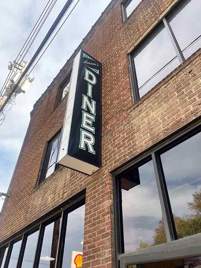 The vintage vertical sign points hungry travelers toward Main Street comfort food that's stood the test of time.