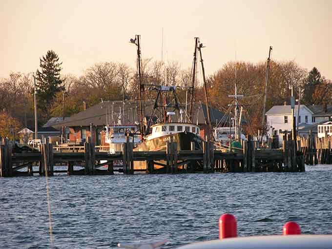 Working fishing boats tied up at sunset remind you that some towns still earn their living from the sea.