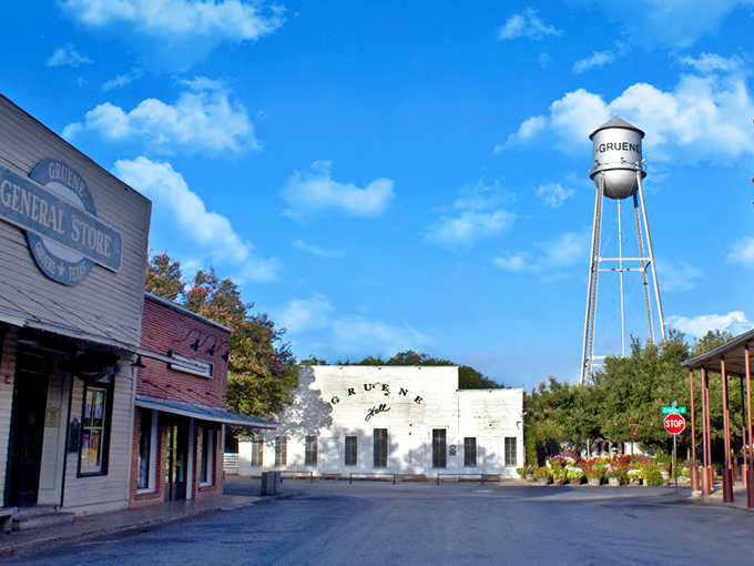That iconic water tower stands guard over brick storefronts where time moves at its own unhurried pace.