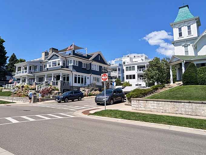 Victorian elegance meets lakeside living where grand homes overlook streets that whisper tales of summer romance.