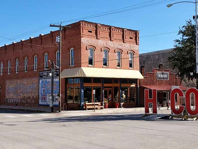 Red brick architecture meets small-town Texas where every storefront tells a different chapter of history.