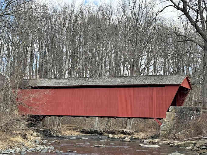 That striking red exterior reflects perfectly in calm waters below, doubling your pleasure like a Wrigley's commercial come to life.