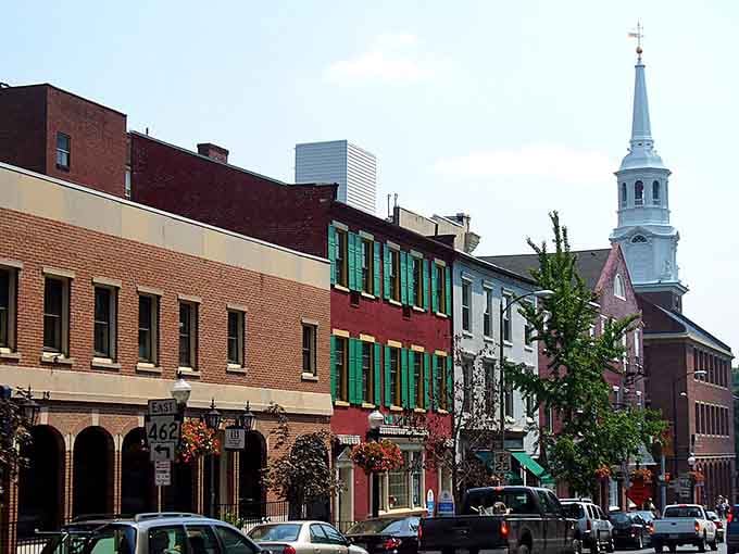 Church steeples peek above the storefronts, reminding you that some towns still have that classic Main Street America vibe going strong.