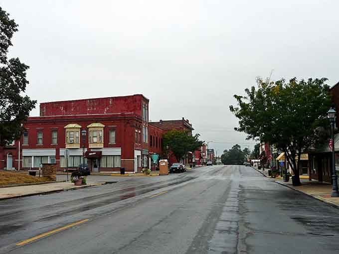 Rain-slicked streets reflect the quiet dignity of buildings that have weathered countless storms and sunny days alike.