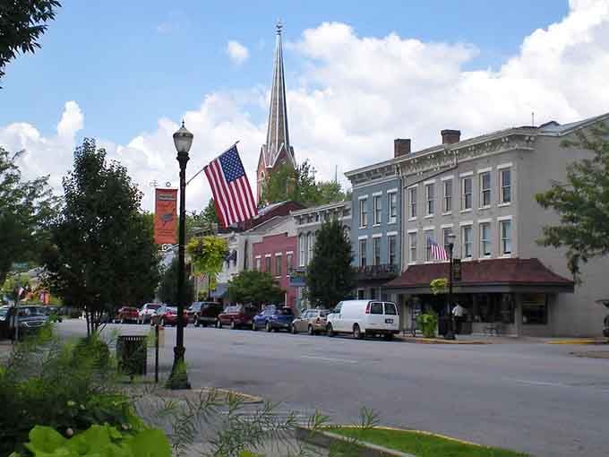 That church spire and American flag create a patriotic scene worthy of a Norman Rockwell painting.