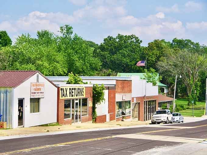 Fresh pavement meets vintage storefronts, proving progress and preservation can shake hands and become best friends together.