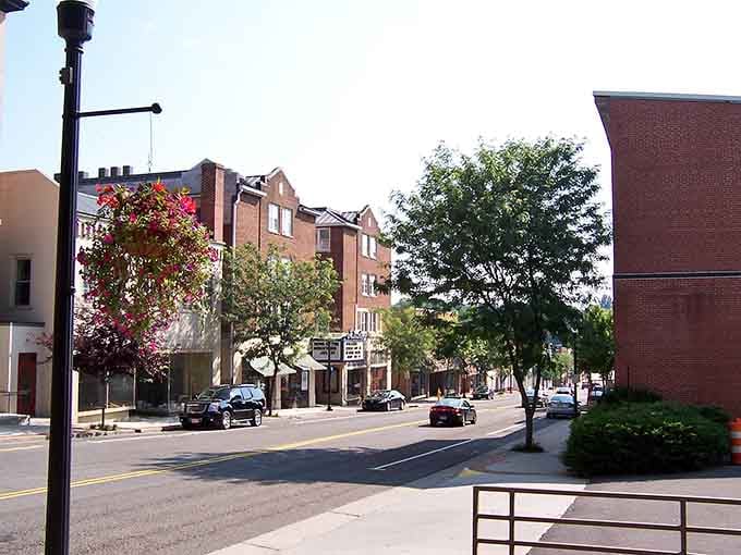 Historic buildings frame this intersection where the pace of life rewards those who choose to linger and observe.