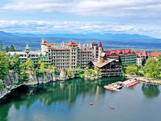 That emerald lake mirrors architectural splendor so perfectly, even your camera gets confused about which way is up.