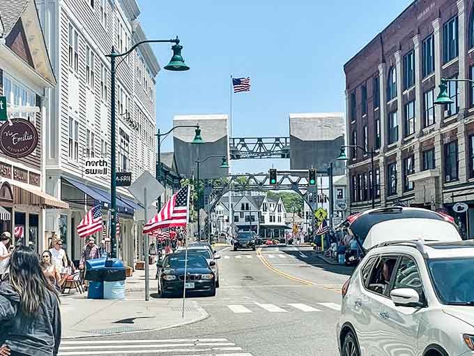 American flags line the street creating a patriotic corridor that would make Norman Rockwell smile.