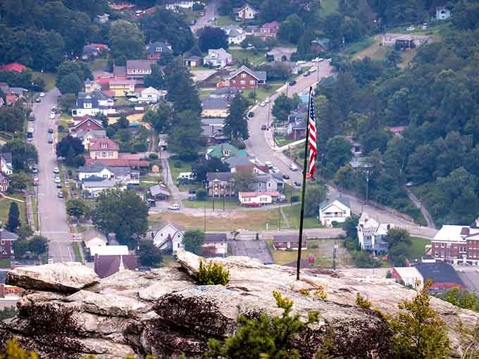 From this rocky perch, the whole town spreads below with Old Glory waving like a patriotic exclamation point.