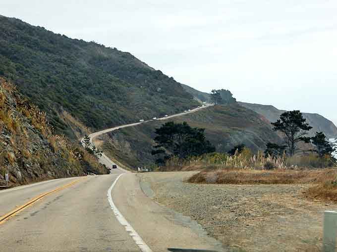 Enjoy a stunning coastal drive along the highway where winding roads meet beautiful, sweeping mountain and ocean views.