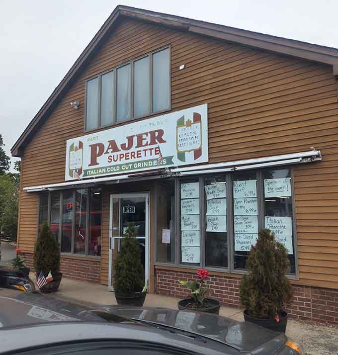 Those handwritten menu boards in the windows tell stories of recipes passed down through generations of sandwich masters.