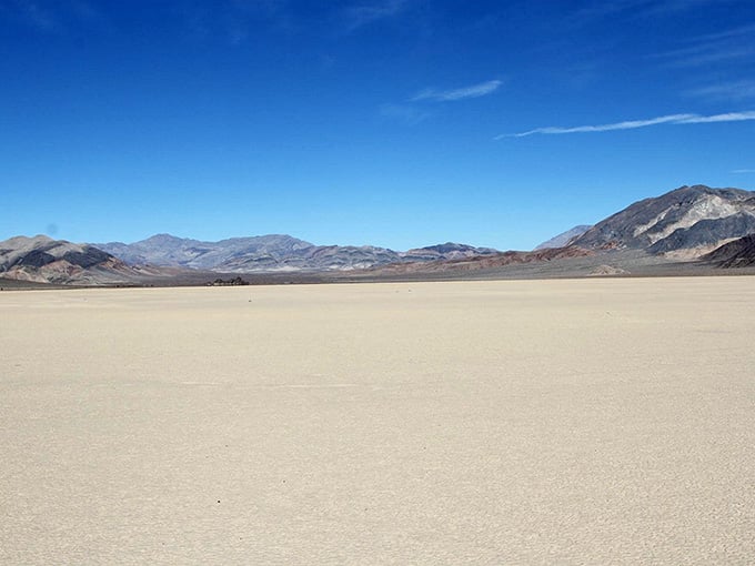 Mountains rise beyond the pale lakebed, framing a landscape so otherworldly it could double for Mars.