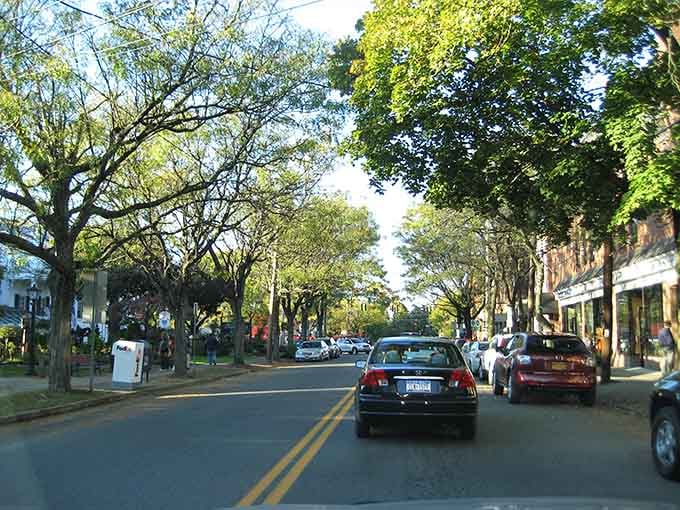 Green spaces meet shaded sidewalks in a town where taking leisurely strolls is practically written into the local constitution.