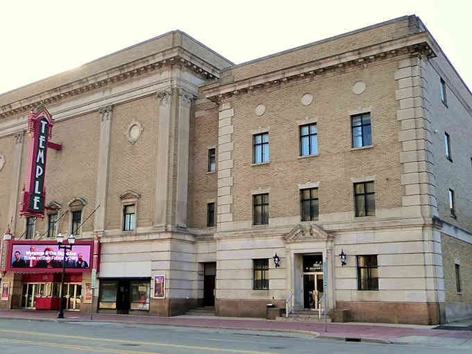That Temple Theatre marquee glows with promise, a beacon of culture in this revitalized downtown district.