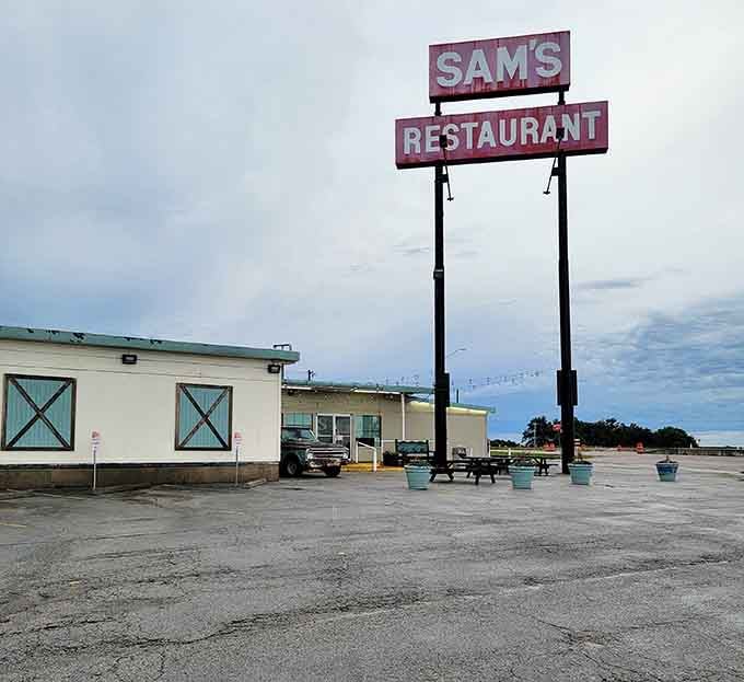 That classic sign stands tall like a beacon for anyone craving honest country cooking on the highway.