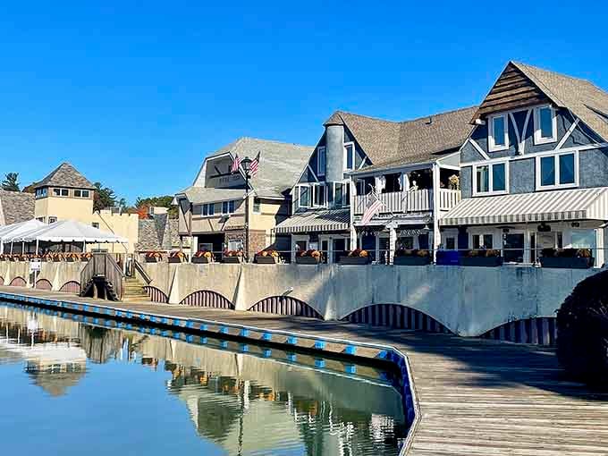 Tudor-style architecture reflecting in calm waters creates a scene straight out of a postcard your grandmother would've sent.