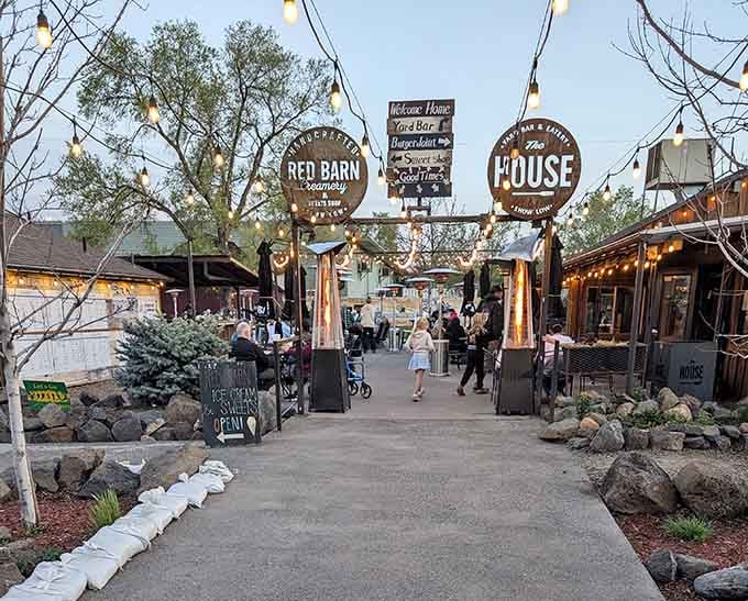 String lights transform this outdoor dining complex into a magical evening destination worth lingering at.