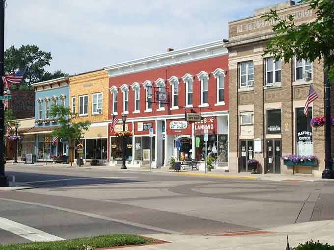 Red, blue, and cream storefronts pop like a patriotic parade frozen in architectural form and function.