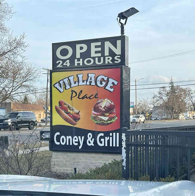 The "Open 24 Hours" declaration means your hot dog cravings never have to wait until tomorrow, thank goodness for that.
