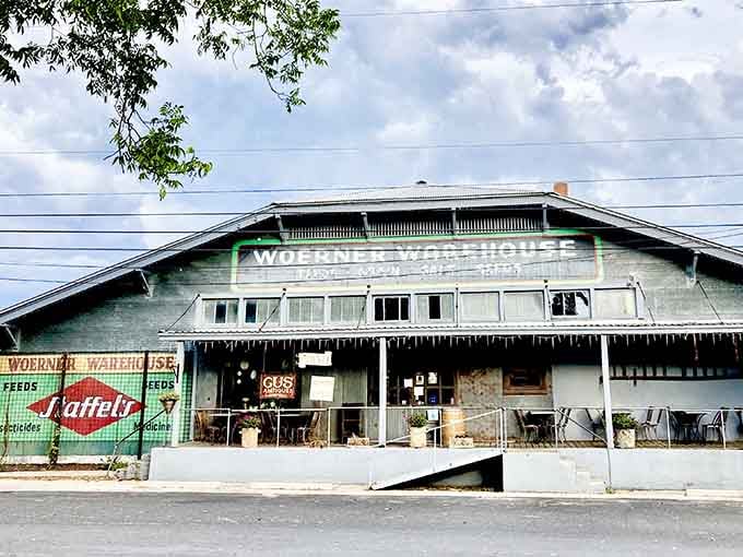 The vintage signage and industrial bones create an atmosphere where German schnitzel meets Texas-sized portions perfectly.