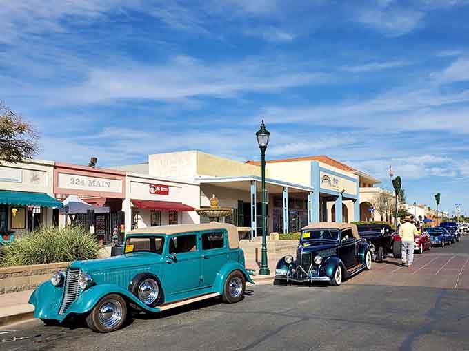 Classic cars cruise past storefronts where the prices haven't changed as much as you'd think since 1955.
