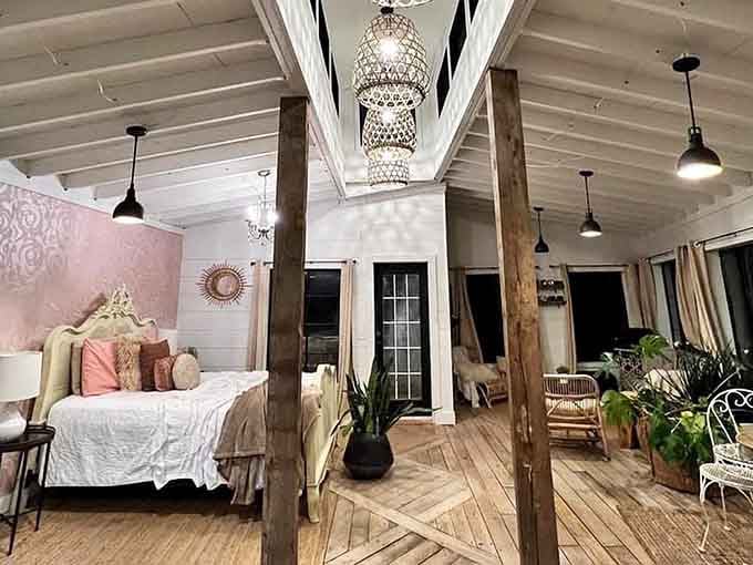 High ceilings, elegant lighting, and tree trunks as decor—nature's version of exposed brick beams.