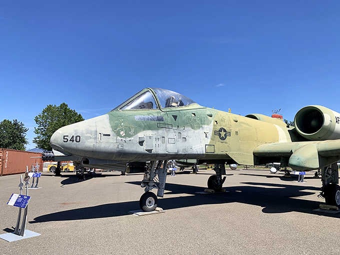The A-10 Warthog sits ready for inspection, its distinctive nose and rugged design still commanding respect after decades.