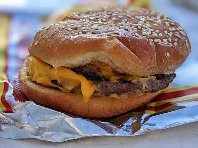 Melted cheese cascading over a perfectly cooked patty, this cheeseburger is the kind of thing dreams are made of.
