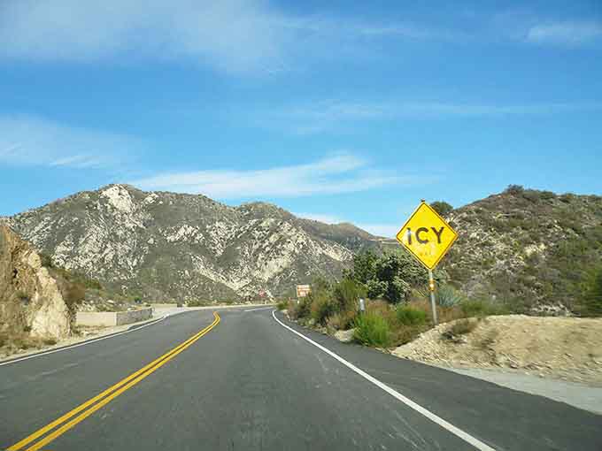 Yellow warning signs promise excitement ahead, the kind that makes passengers grip their armrests with glee.