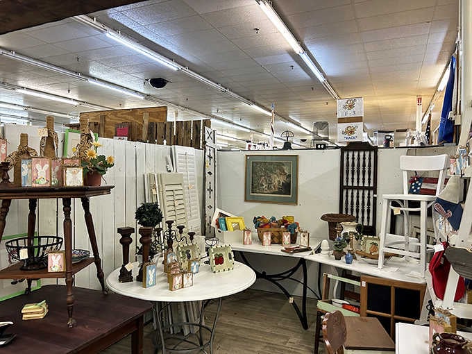 This vendor booth showcases the eclectic charm that makes every corner feel like discovering your grandmother's attic.