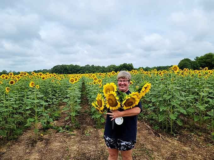 Pure happiness captured in one frame, surrounded by enough yellow to power a smile for weeks afterward.